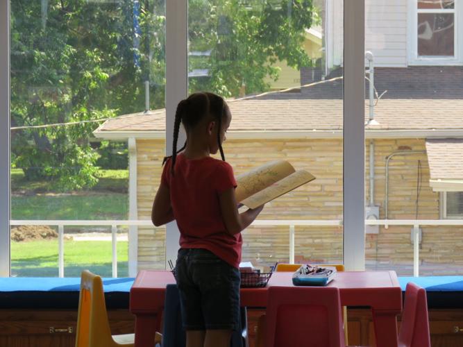 Collinsville Library reopens after major remodel with improved look ...