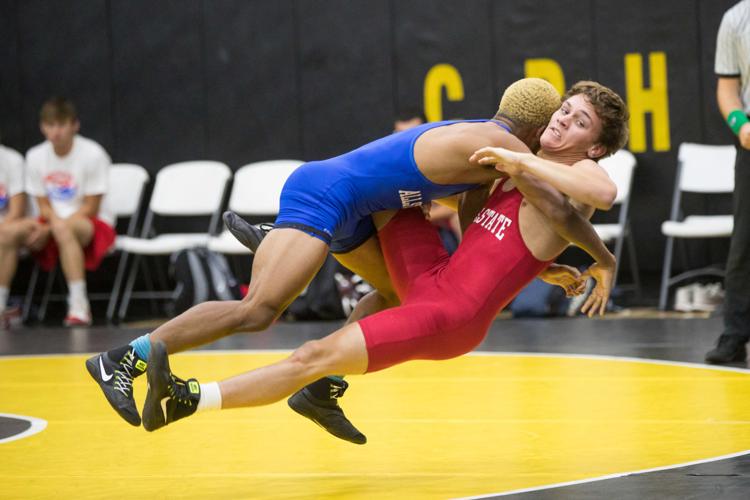 All-State Wrestling: Too small for other sports, McLain's Thaddeus Long ...