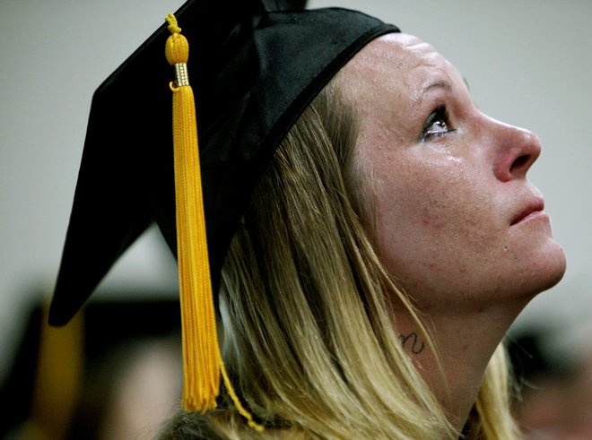 Inmates receive GEDs at graduation ceremony behind bars