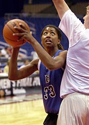 Tillis scoring big on, off the court