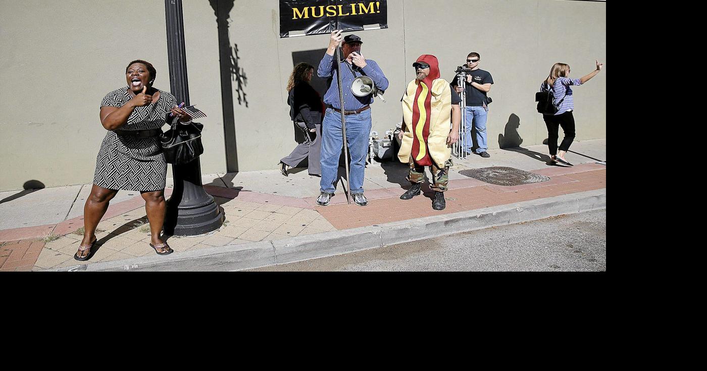 Muslim group's first time in Veterans Day parade met with sporadic ...