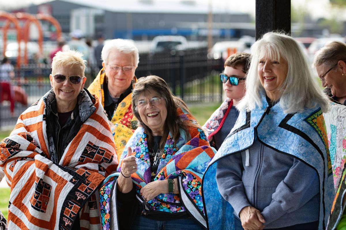 Owasso quilters showcase custom quilts in annual parade dedicated to craft