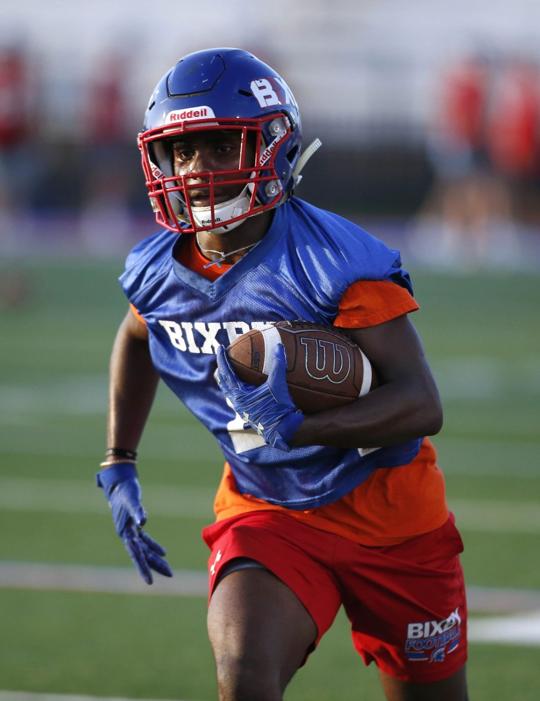 High school football practice opens with teams balancing preparations ...