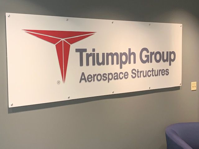Aerospace company moving employees from airport to Philcade Building ...