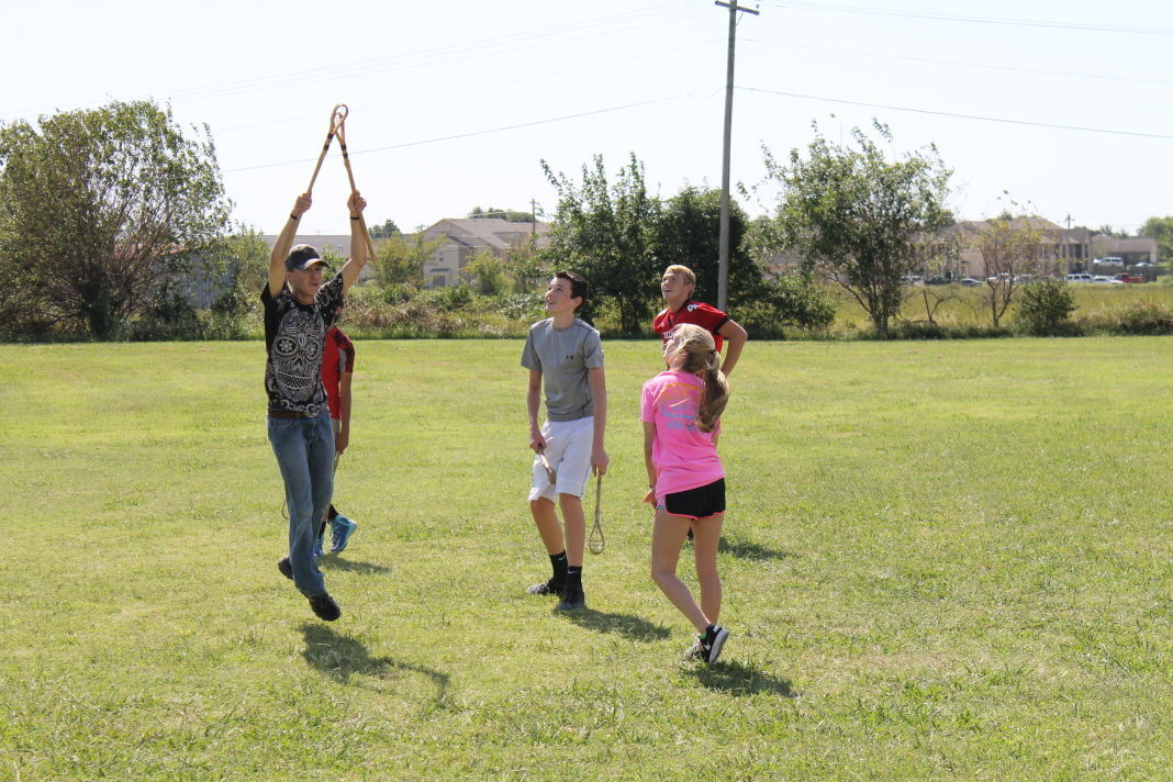 High school students learn Cherokee stick ball | Photovideo ...