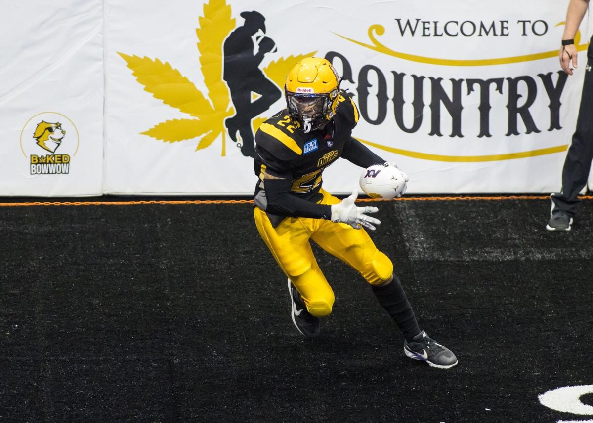 Tre Harvey's late TDs rally football Oilers past Iowa for first-ever victory