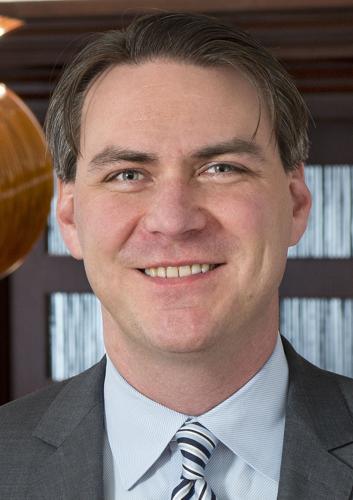 Law: Michael S. Booze, HALL ESTILL