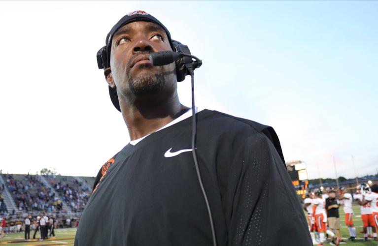 For Booker T., tough issues and search for a football coach