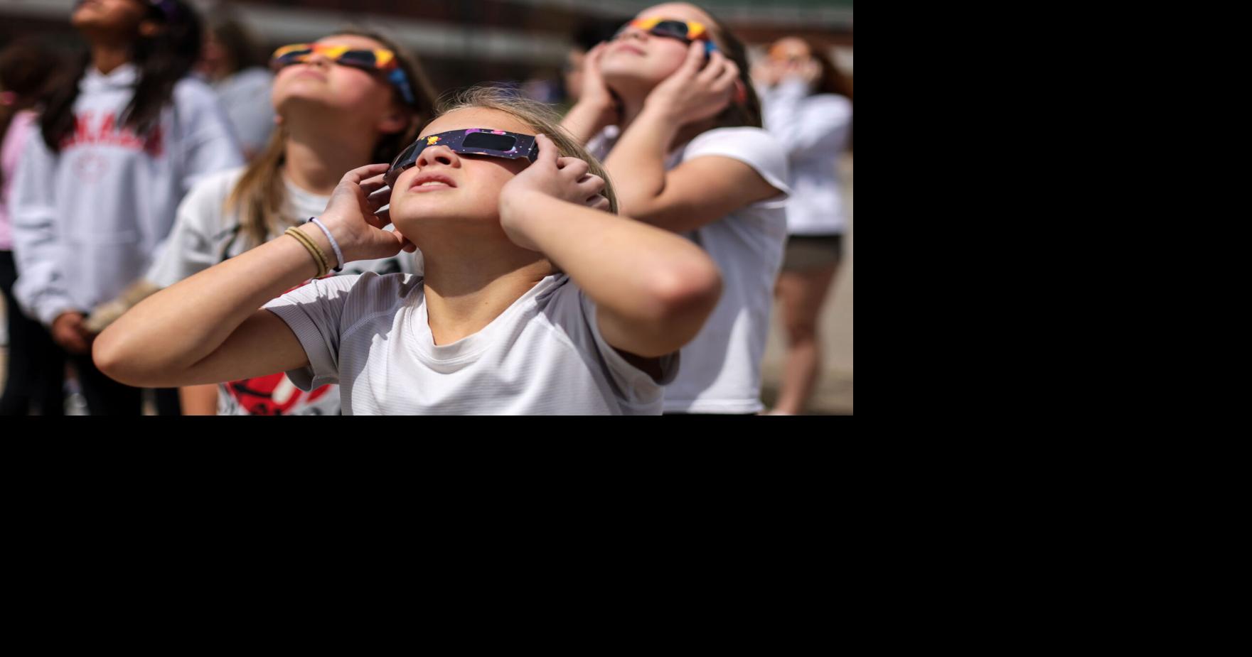Photos: Adults, kids enjoy Monday's eclipse in Tulsa area