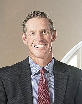 Law: John F. Heil, III; HALL ESTILL