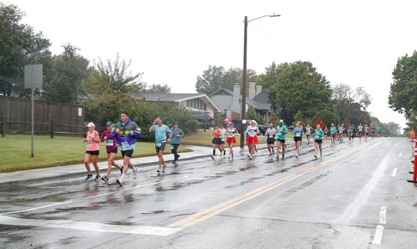 `Blues Brothers' extend streak in rainy Tulsa Run