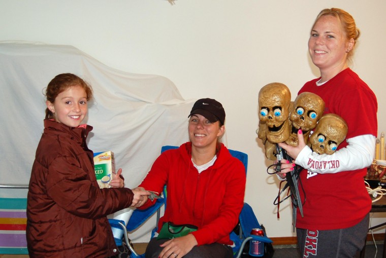 Rain doesn't wash away city-wide garage sale