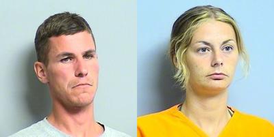 Three charged in bank robbery heist