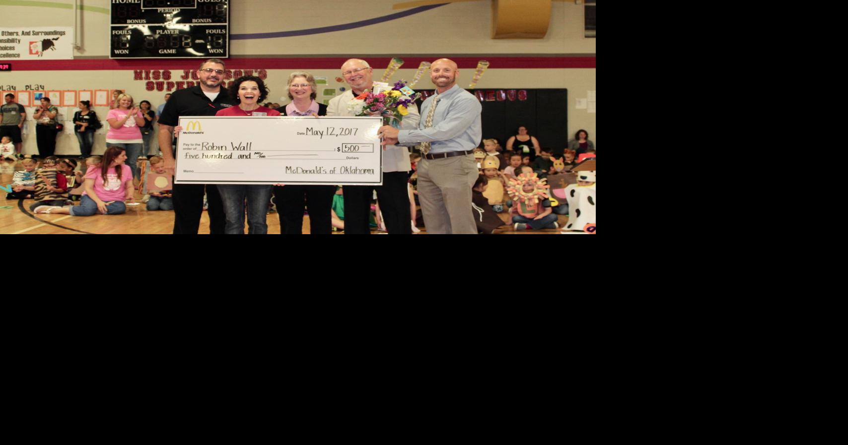 Owasso Teacher of the Year Robin Wall awarded $500 check