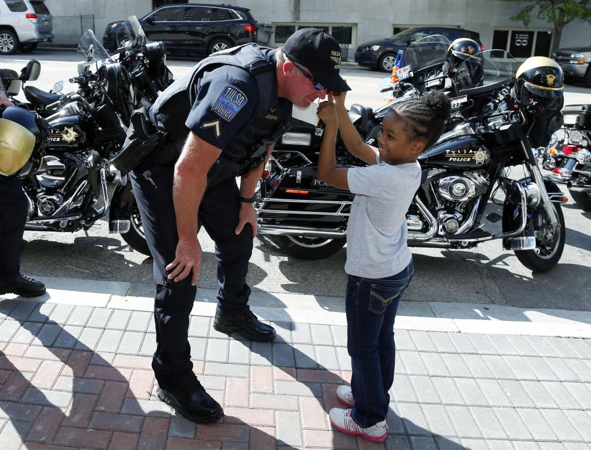 This 7-year-old is on a mission to hug a cop in all 50 states. Her stop ...