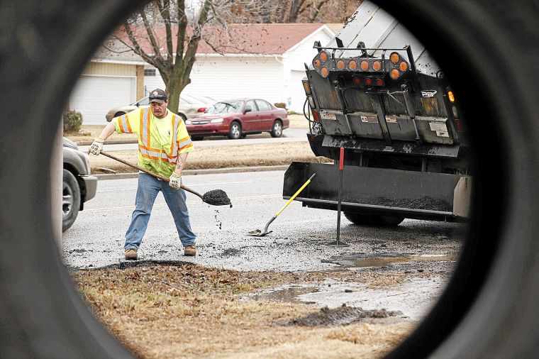 Pothole problems continue as city works with shorter staff, poor weather