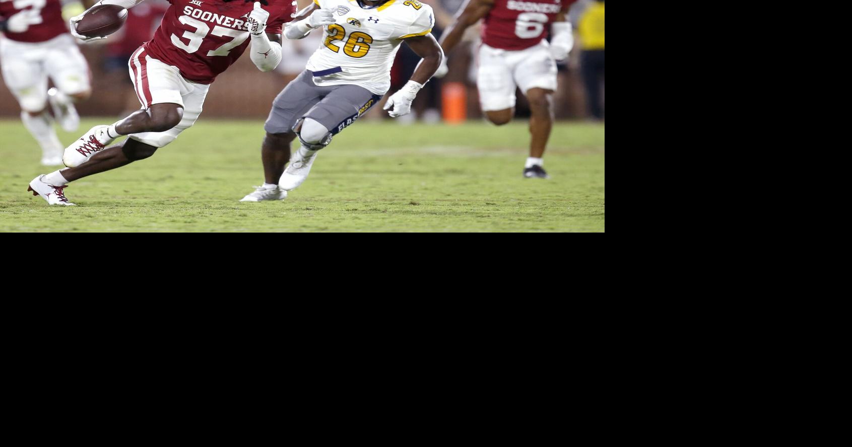 Photos: OU rolls Kent State, 33-3