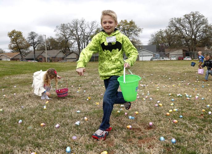 girl dropping easter eggs