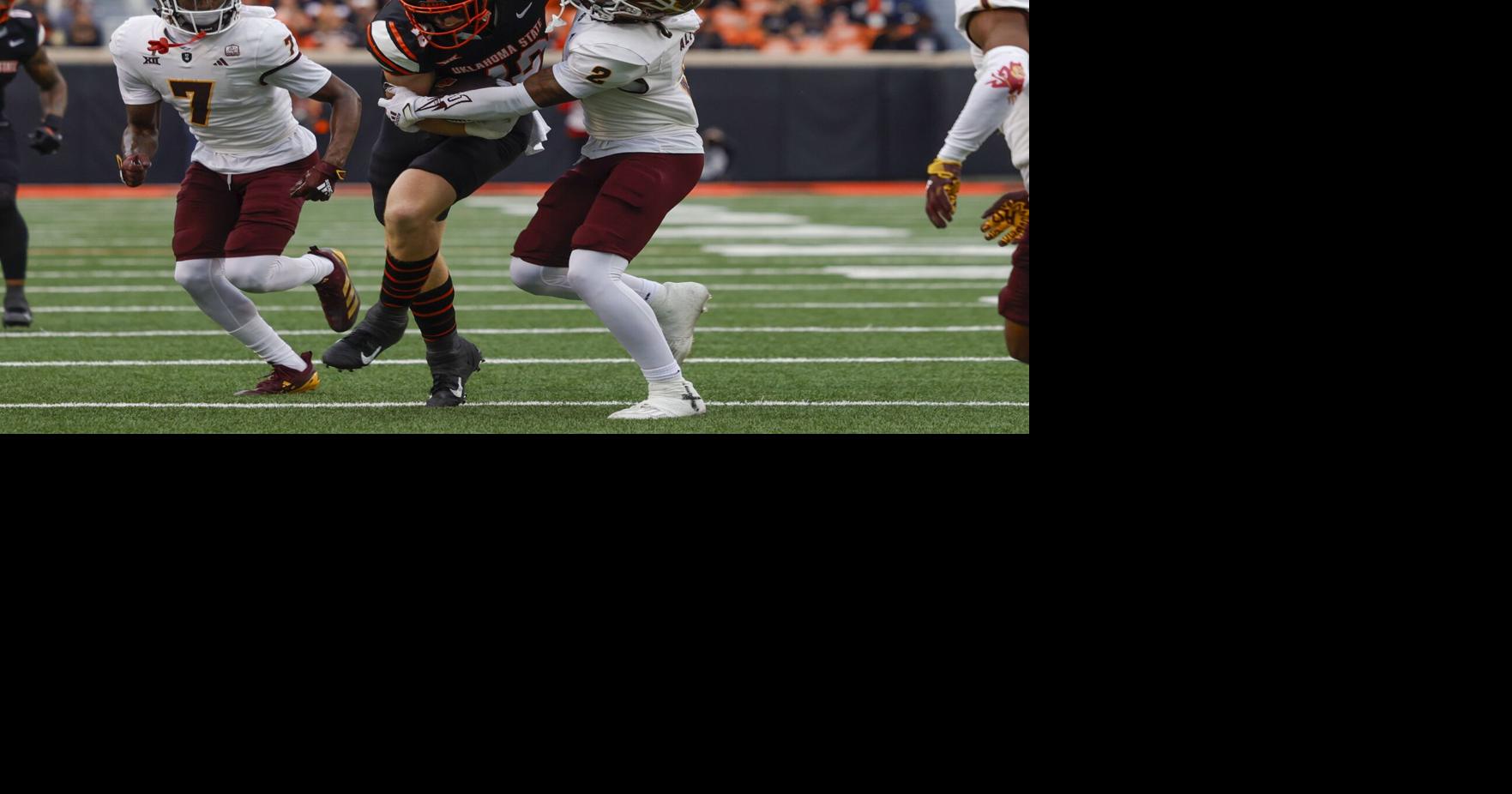 OSU's retro look means more than a mullet for Cowboy TE's