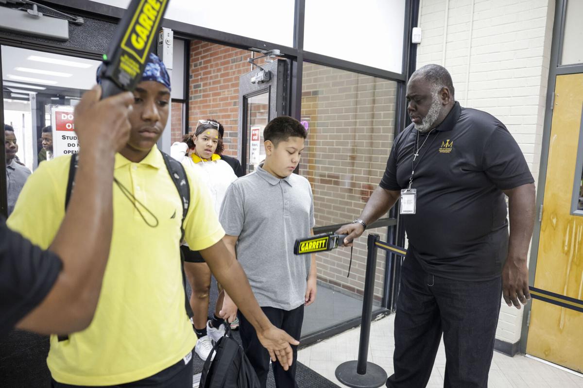 Men of Monroe volunteer at Tulsa middle school