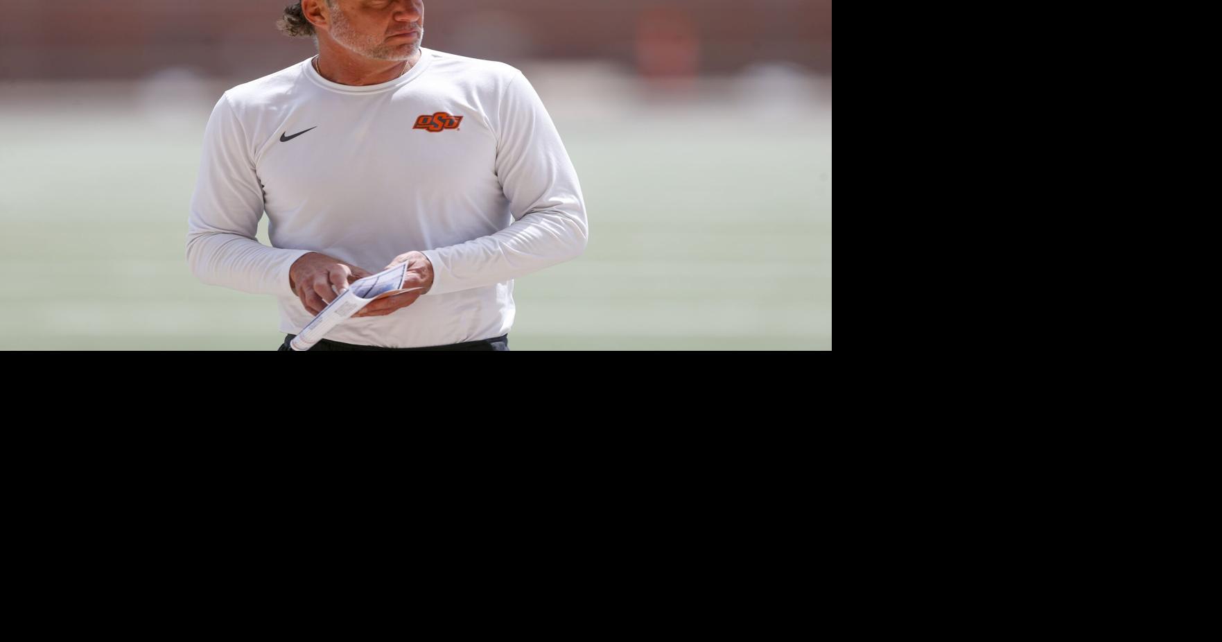 OSU coach Mike Gundy appears on stage during Zach Bryan concert in Tulsa