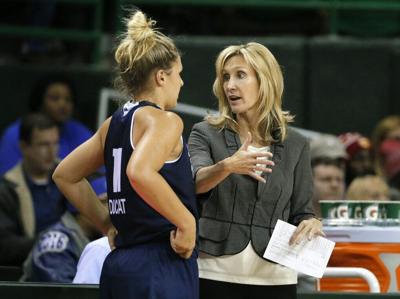 Column: For Huskies women's basketball, hiring of coach Tina Langley is ...