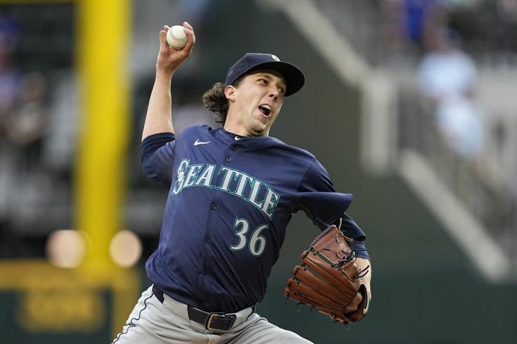 Julio Rodriguez hits first homer, Mariners move into first with win ...