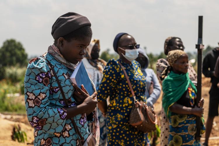 Mourners bury a 6-month-old Ebola victim in the Congo outbreak's third ...