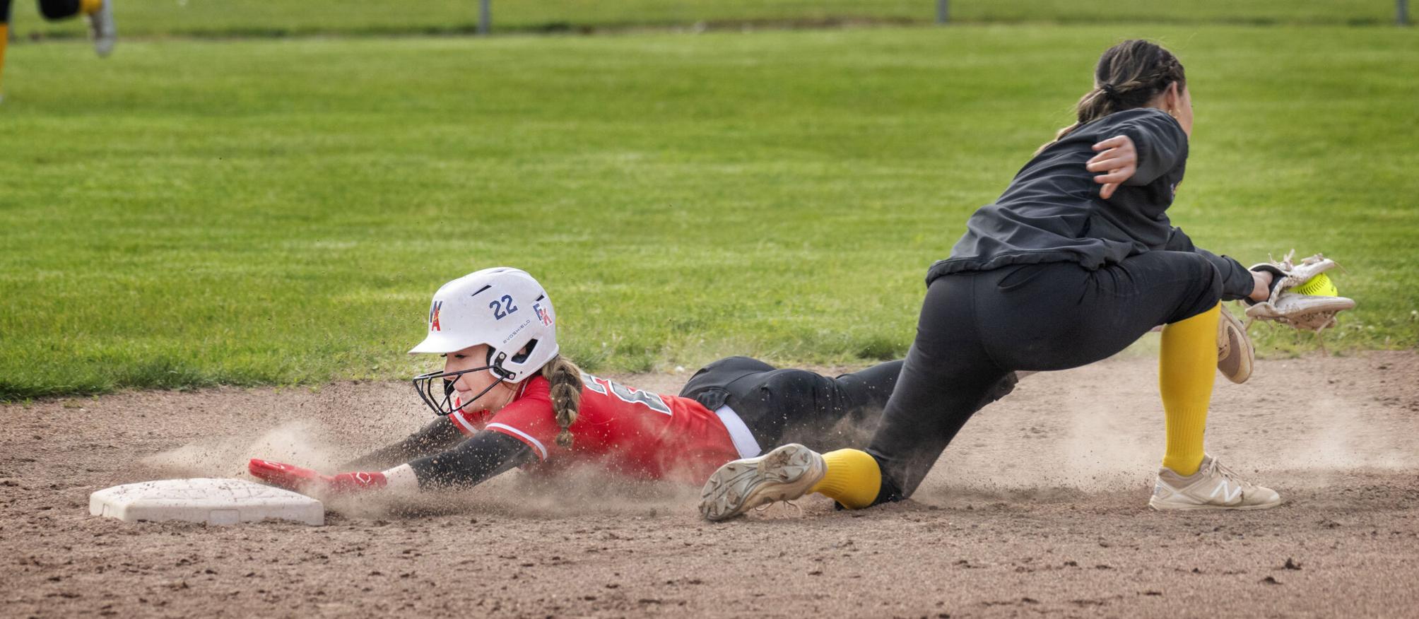 Weston-McEwen High School's softball team battling in Athena | Photo ...