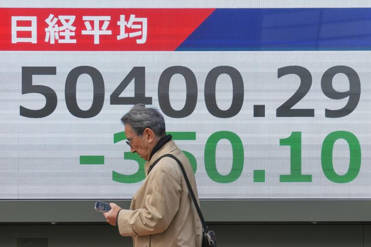Asian shares are mixed in quiet holiday trading after a lackluster post ...