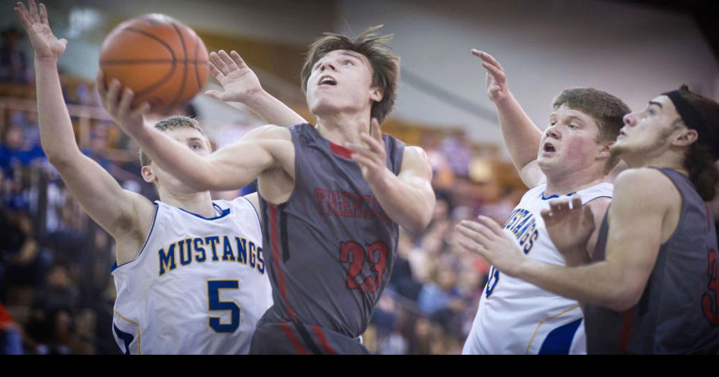 Weston-McEwen High's boys basketball team rallies past Enterprise ...