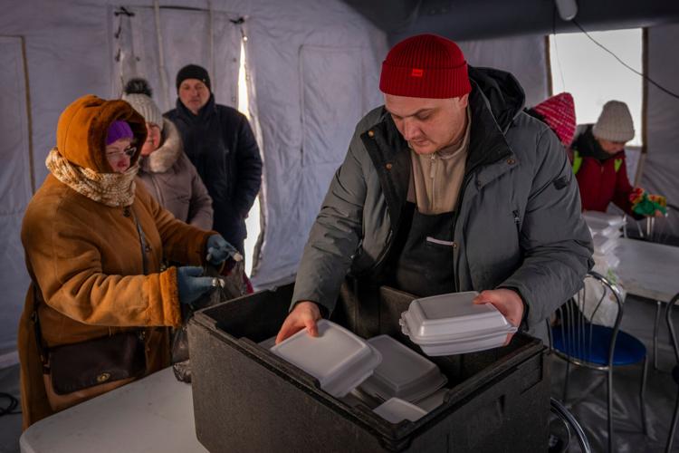 Photos show Ukrainians enduring a frigid winter after Russian strikes ...