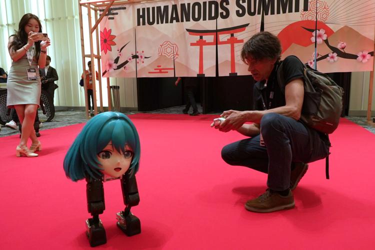 Humanoids dance and thread needles as Japanese robotics developers look ...