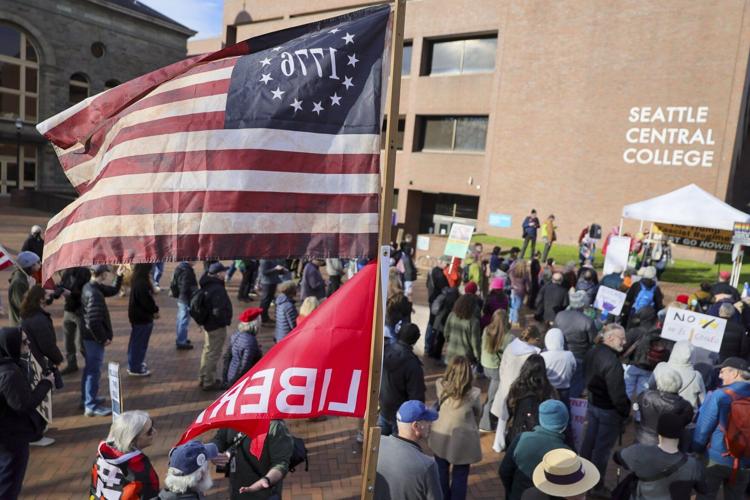 Hundreds in Seattle, Olympia rally to show Trump ‘we are not powerless ...