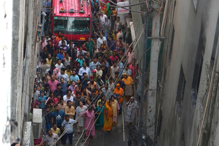 Photos show rescue efforts and aftermath of New Delhi building fire ...