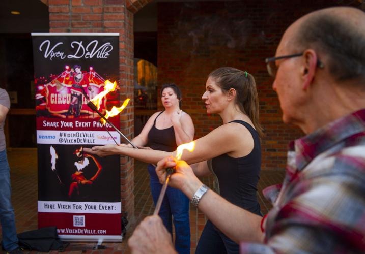 PHOTOS: Burlesque performer Vixen DeVille teaches fire eating in ...
