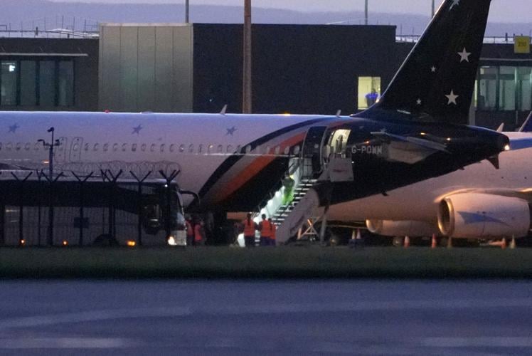 Passengers from virus-stricken cruise ship fly to home countries for ...