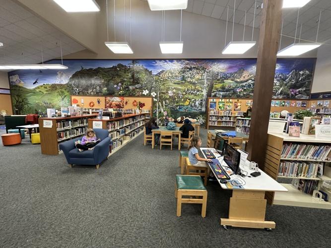 Original artist touches up Central Sierra nature mural at Greenley Road ...