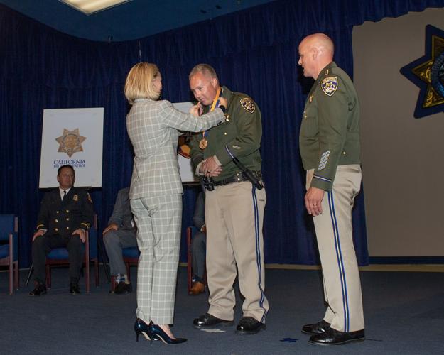Sonora-area CHP officer receives gold Medal of Valor for saving man from burning wreck in Merced ...