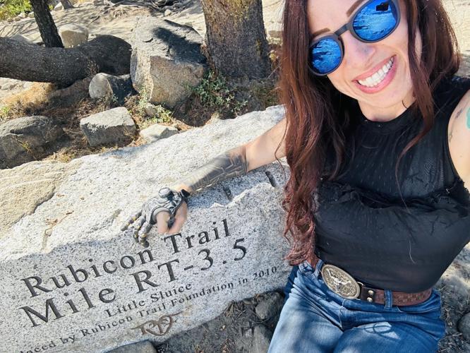 'Bionic Angie': Crystal Falls amputee uses prosthetic fingers to ...