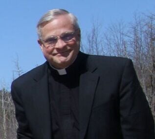 Right-wing Catholic website agrees to pay Manchester priest $500K ...