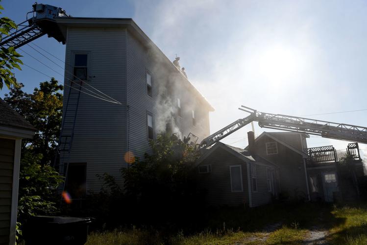 Manchester firefighters help 3rd-floor resident out of burning Maple ...
