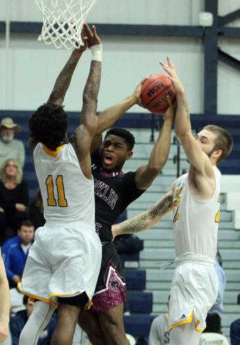 SNHU men's basketball team squeezes Franklin Pierce | College Sports ...