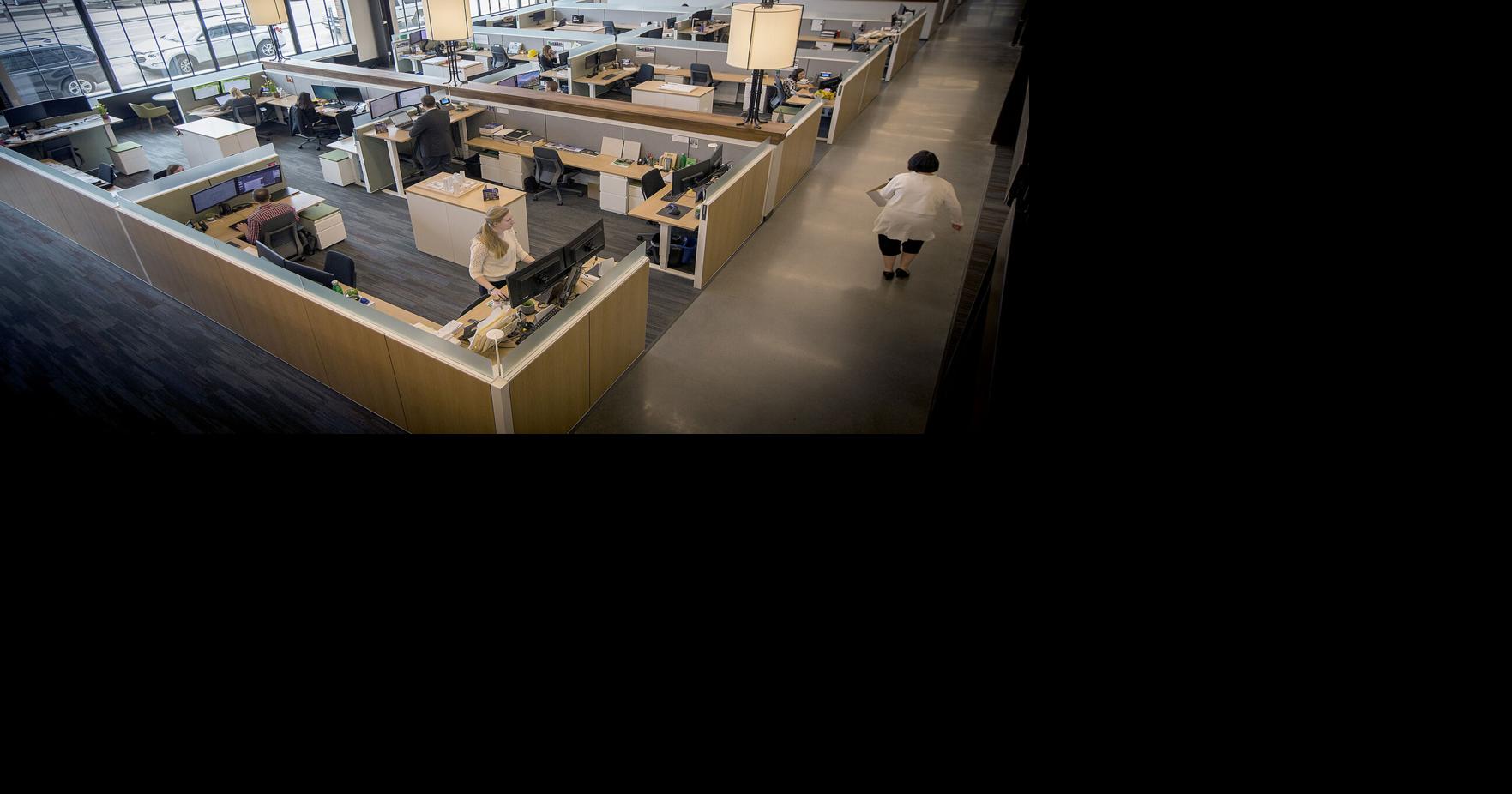 Bye-bye cubicles and corner offices: Reserving a desk for the day is ...
