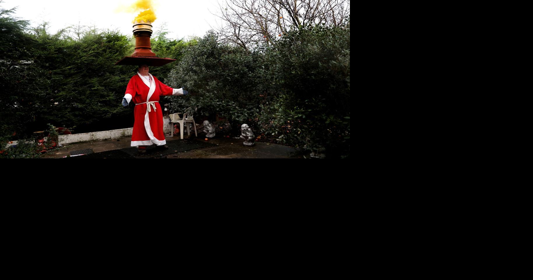 Head-balancing British strongman on record mission for 75th birthday ...