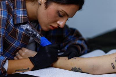 Tattoo ink moves through the body, killing immune cells and weakening ...