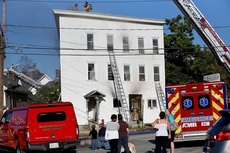 Manchester firefighters help 3rd-floor resident out of burning Maple ...
