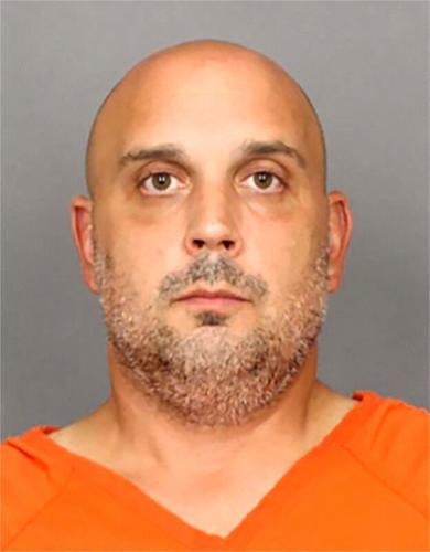 Sean M. Higgins of Woodstown, N.J. poses for a jail booking photograph ...