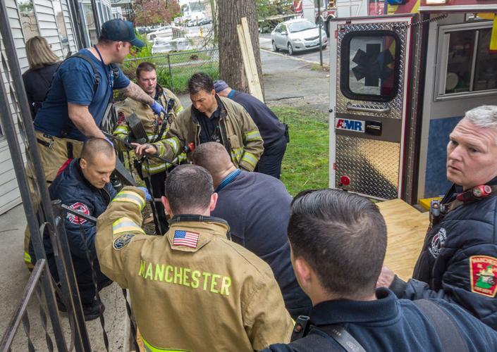 Rescuers put brains ahead of brawn to help get 800-pound man to ...