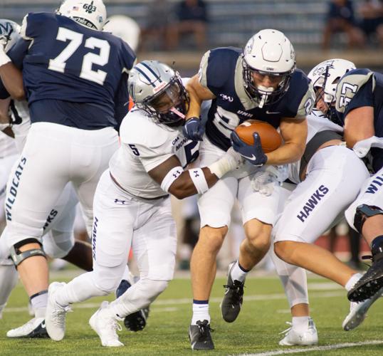 UNH stages late rally to win opener, 31-21, over Monmouth | College ...
